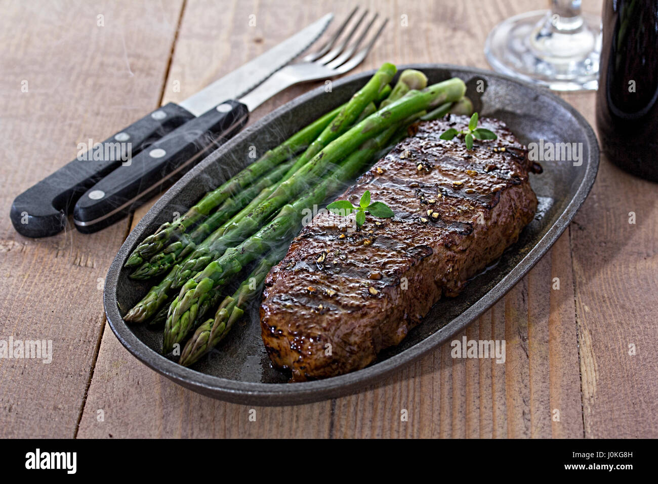 Grilled steak with green vegetables Stock Photo - Alamy