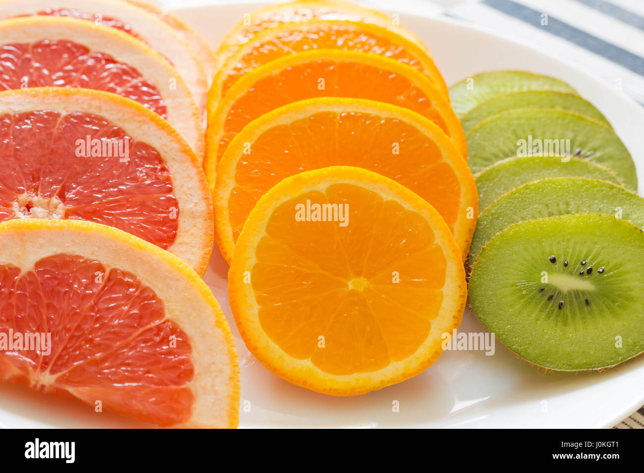 Fresh cutting fruits / vitamins concept Stock Photo - Alamy