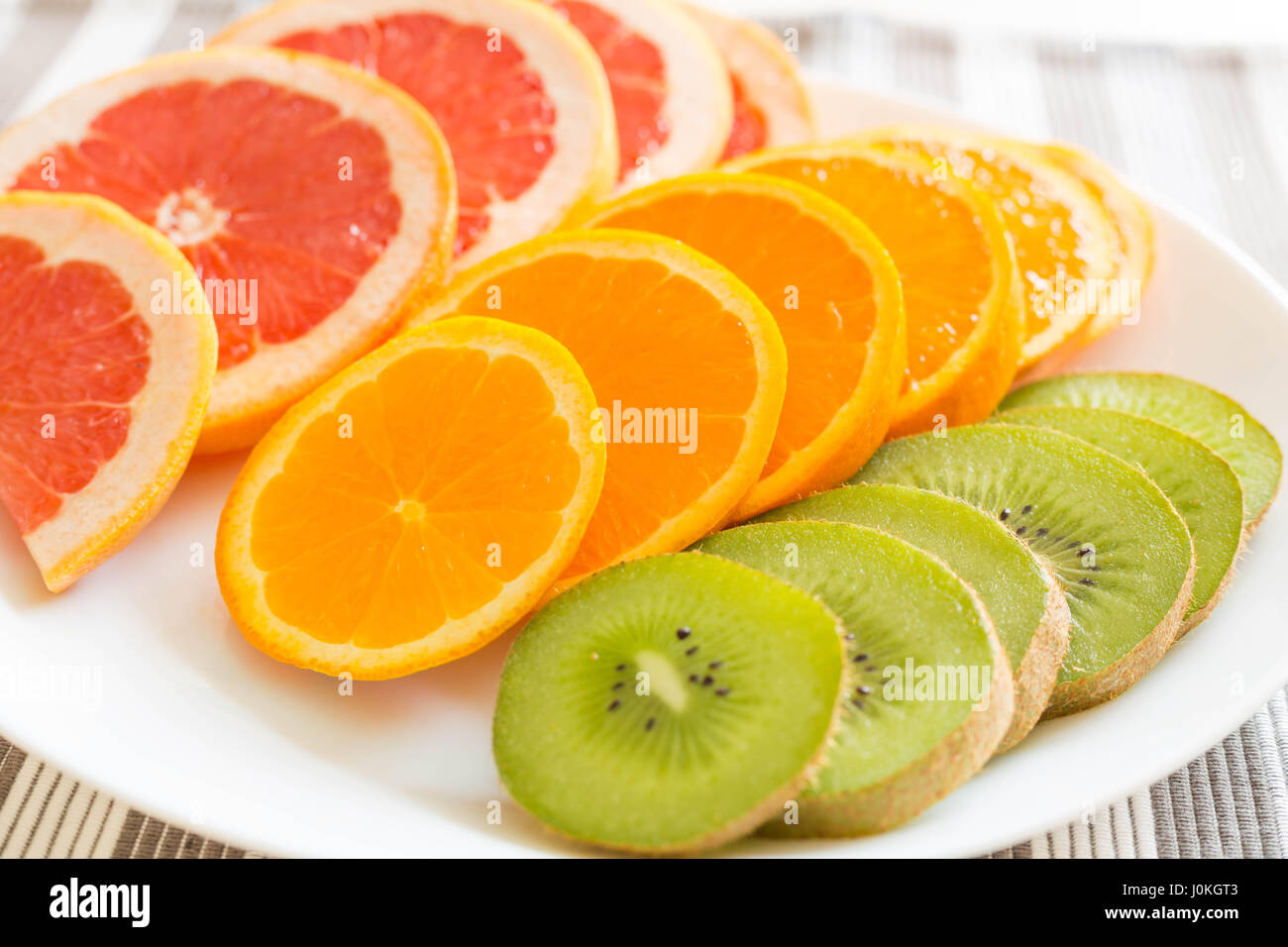 Fresh cutting fruits / vitamins concept Stock Photo - Alamy