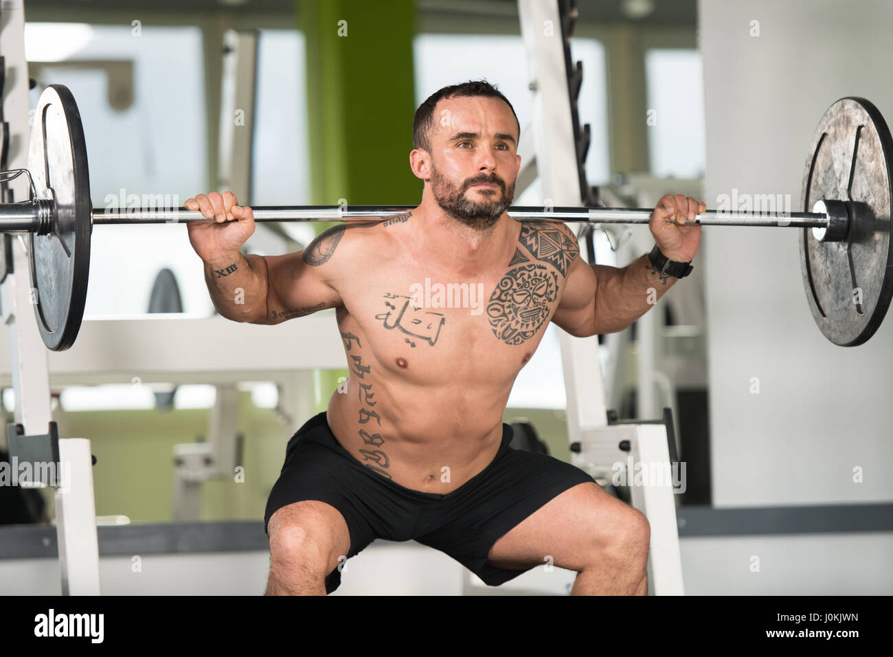 Barbell squat man hi-res stock photography and images - Alamy