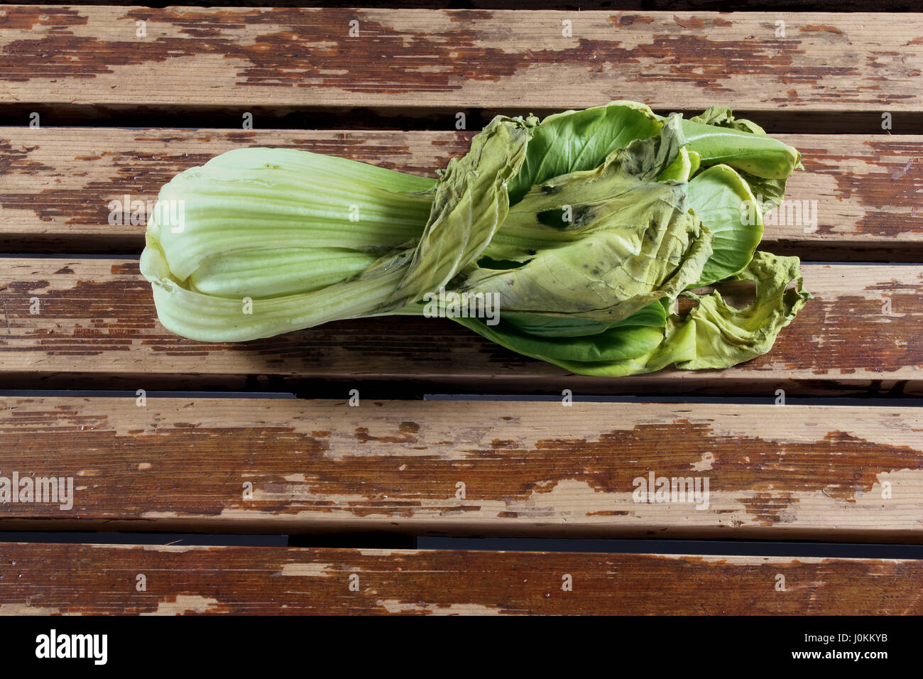 Rotten Vegetable on Wooden Background Stock Photo - Alamy