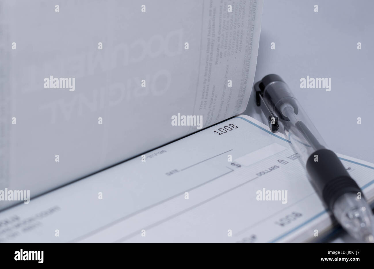Writing a check Stock Photo - Alamy