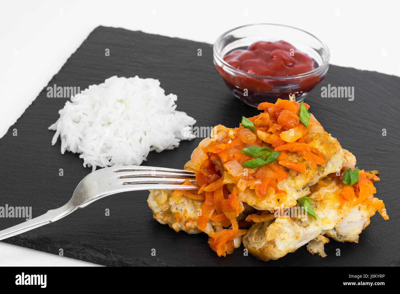White fish with vegetables, side dish of rice. Studio Photo Stock Photo ...