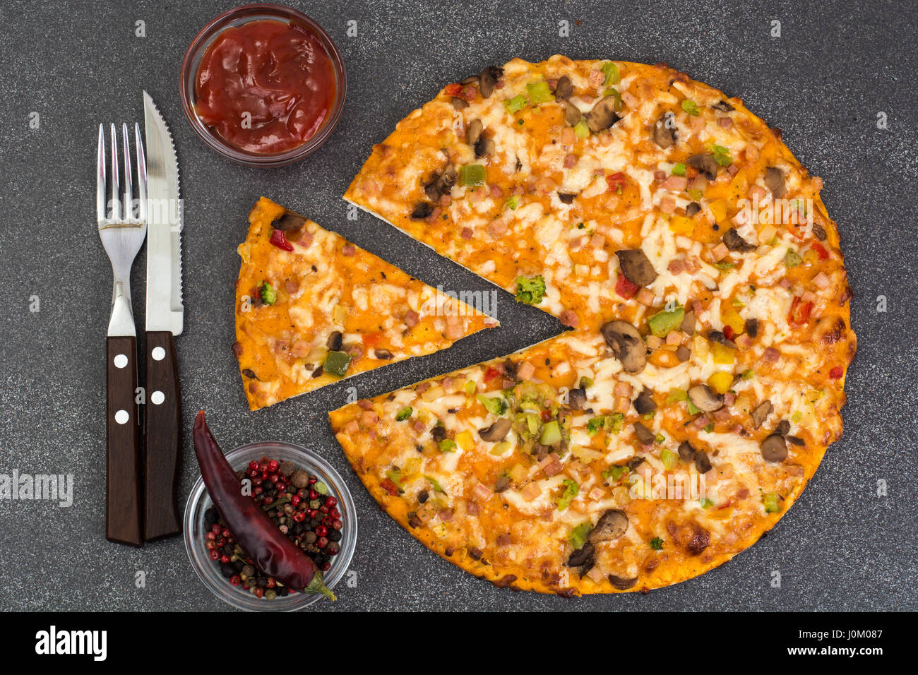 Pizza with mushrooms, cheese and paprika. Studio Photo Stock Photo - Alamy