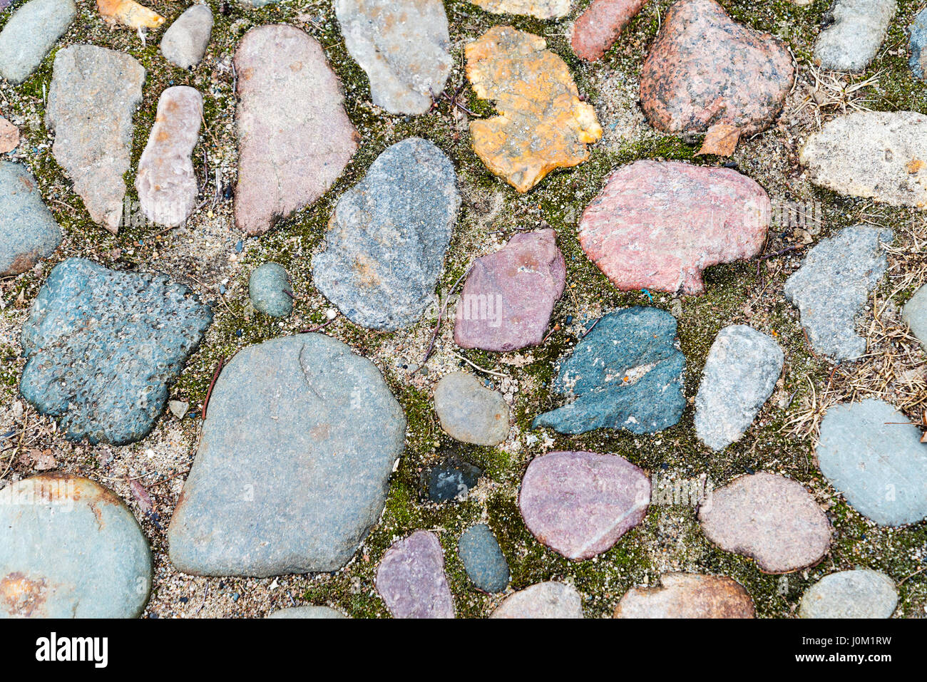 Texture of large and small stones of different colors Stock Photo - Alamy