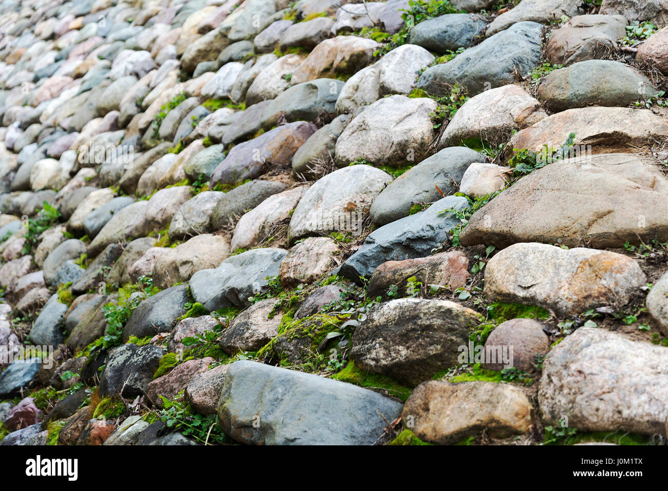 Texture of large and small stones of different colors Stock Photo - Alamy