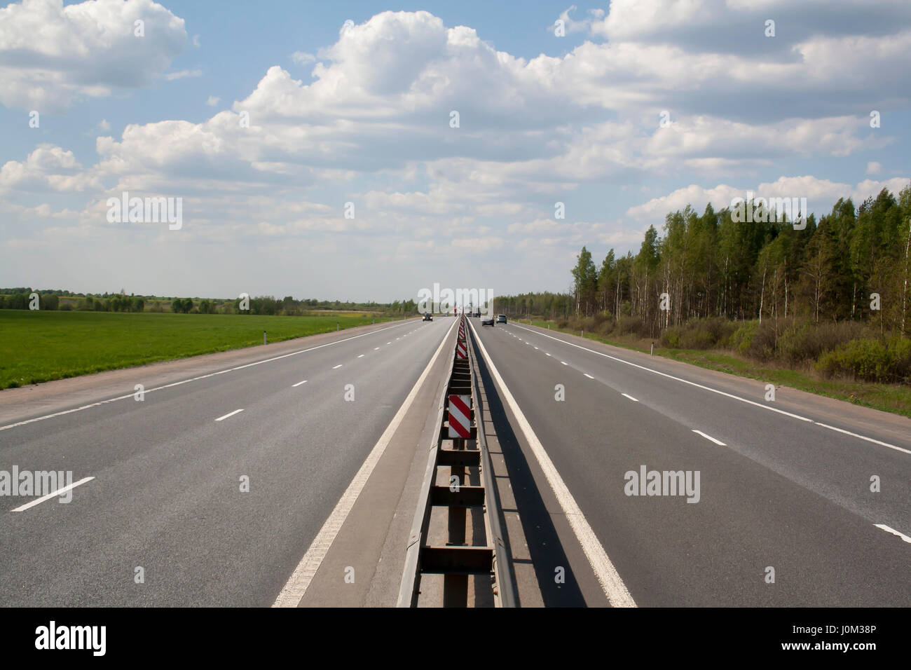suburban broad highway on a cloudy day Stock Photo - Alamy
