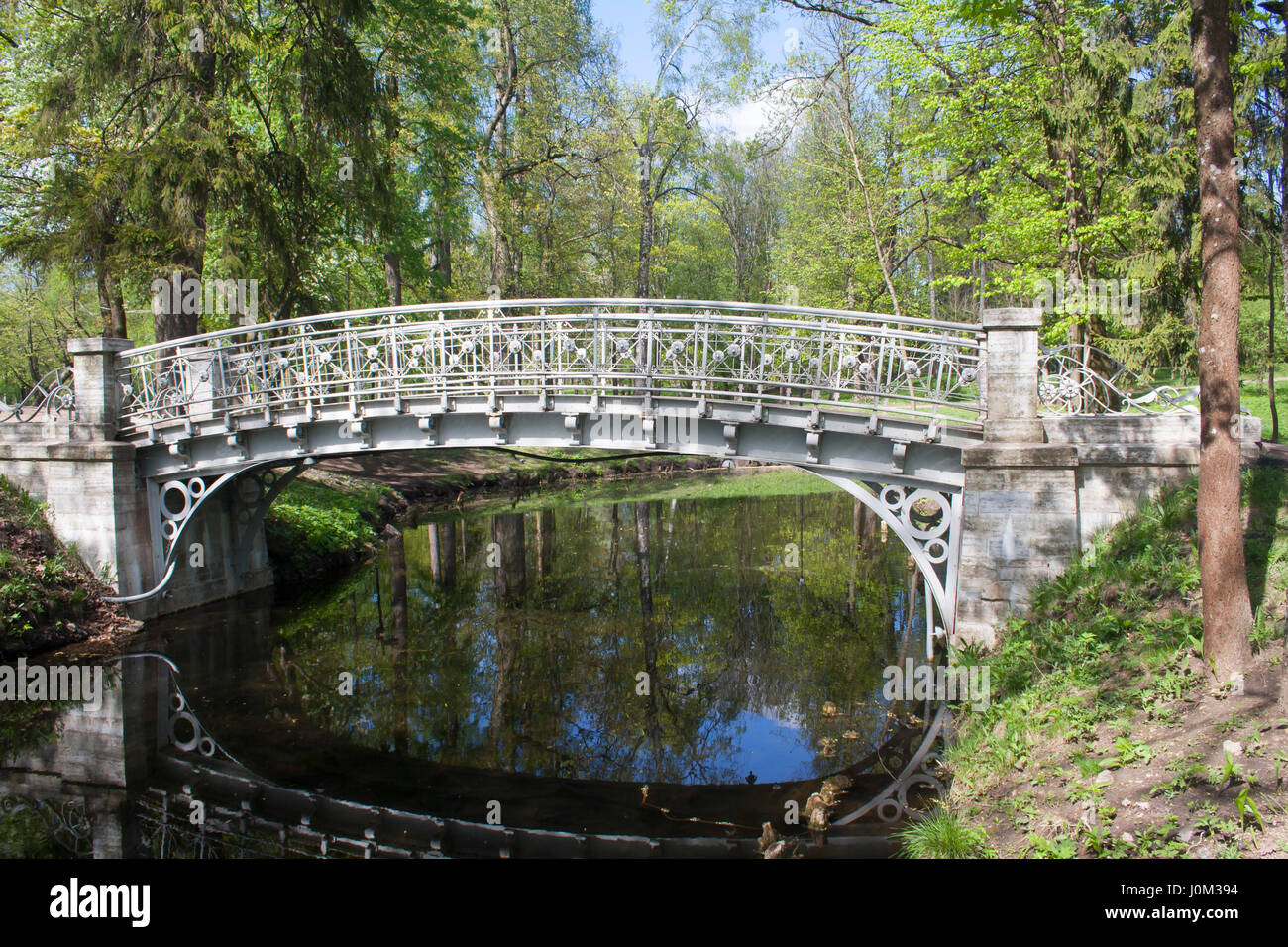a small bridge over a stream in the park Stock Photo - Alamy