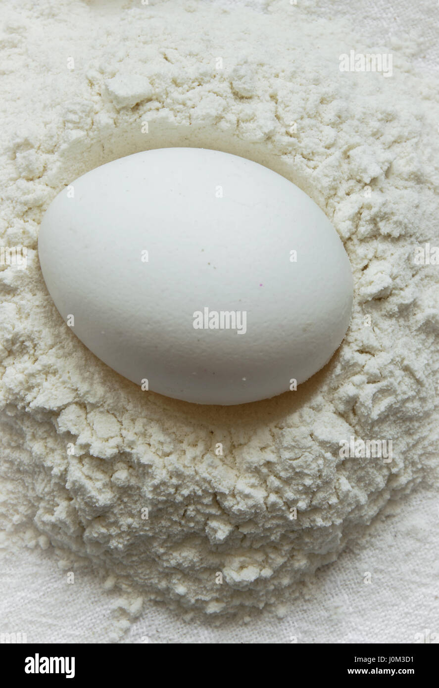 Kitchen for beginners - break the egg from the shell Stock Photo - Alamy