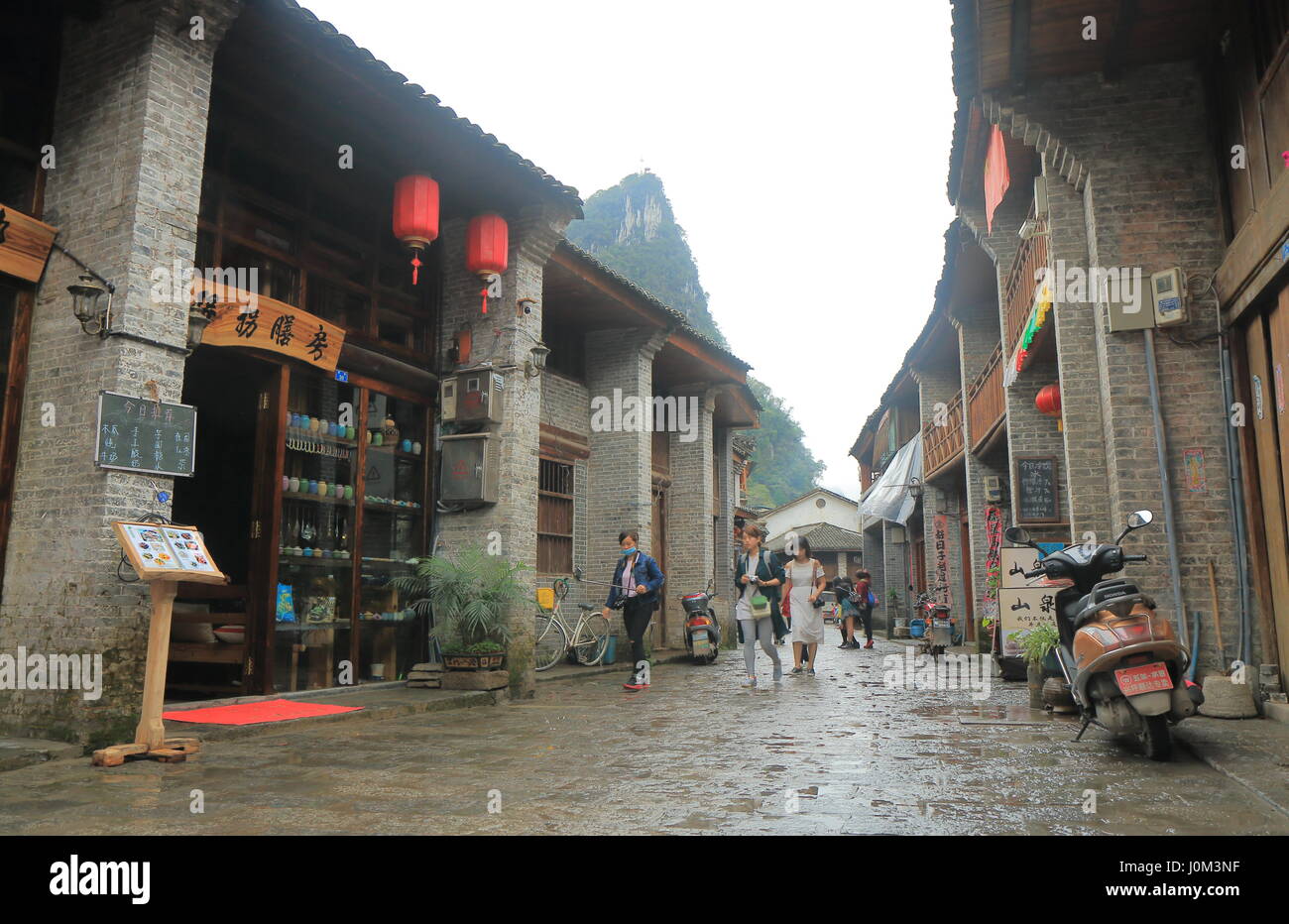 People visit Xingping historical village in Yangshou China. Xingping is ...