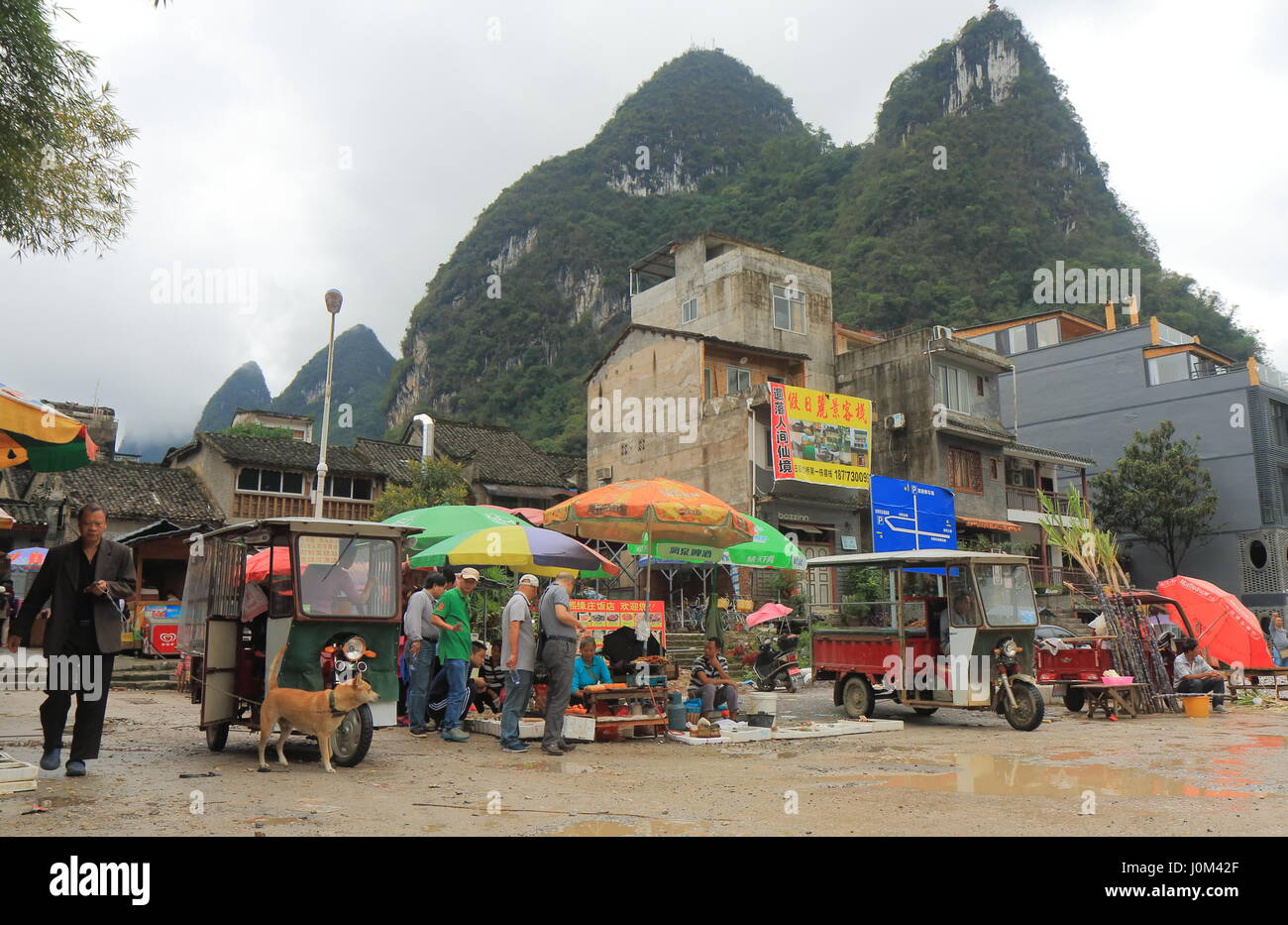 People visit Xingping historical village in Yangshou China. Xingping is ...