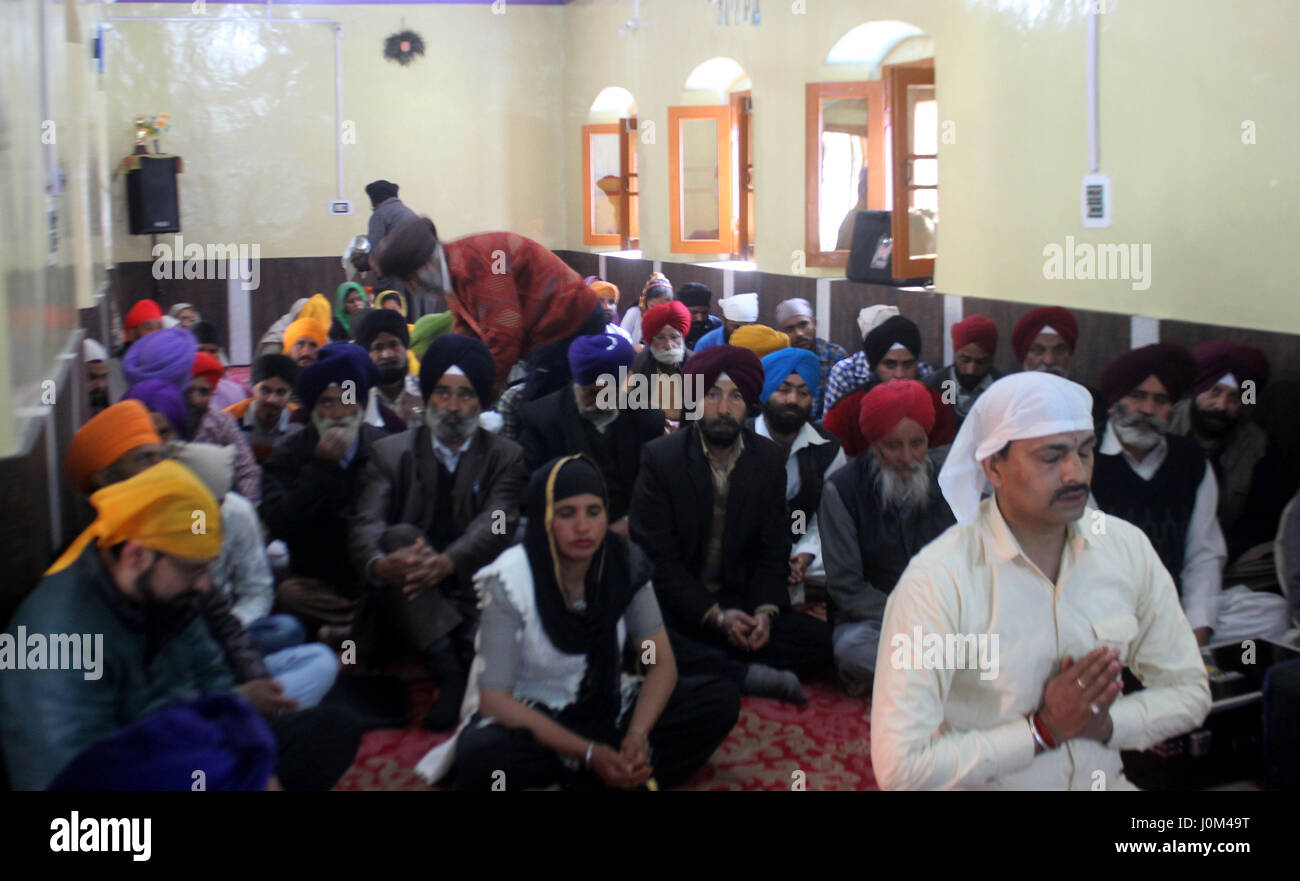 Anantnag, India. 13th Apr, 2017. Kashmiri Sikh devotees pay respects at ...