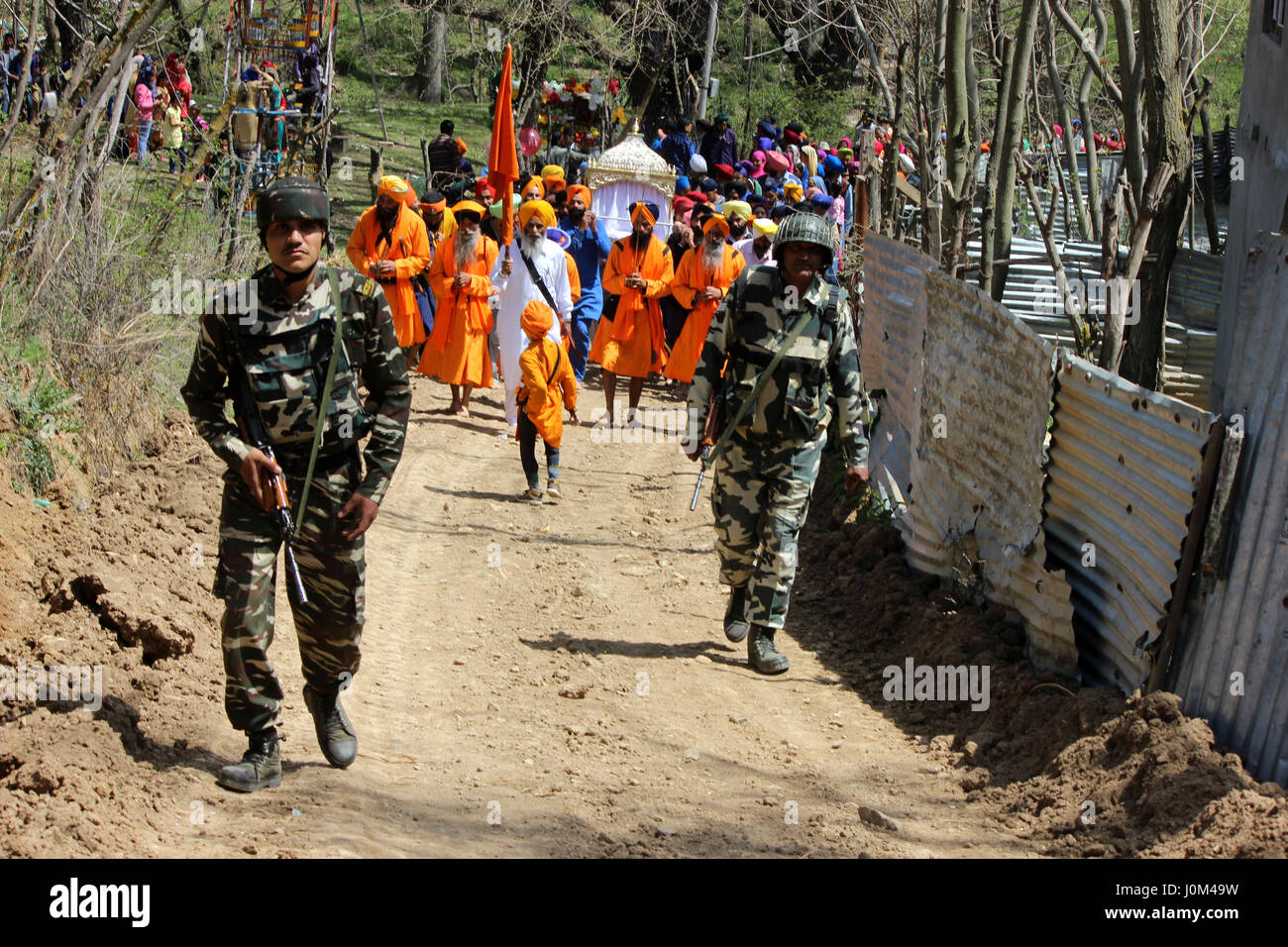 Anantnag, India. 14th Apr, 2017. Indian Paramilitary forces Escorting a ...