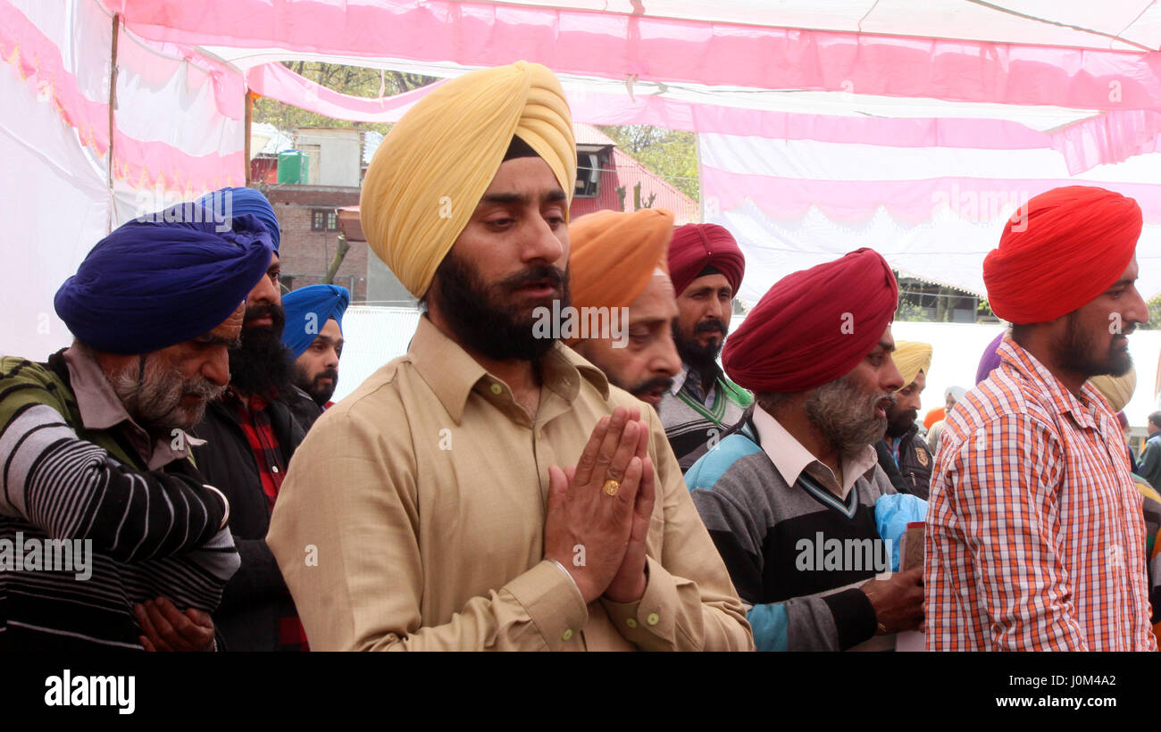 Anantnag, India. 13th Apr, 2017. Kashmiri Sikhs gather to offer prayers ...