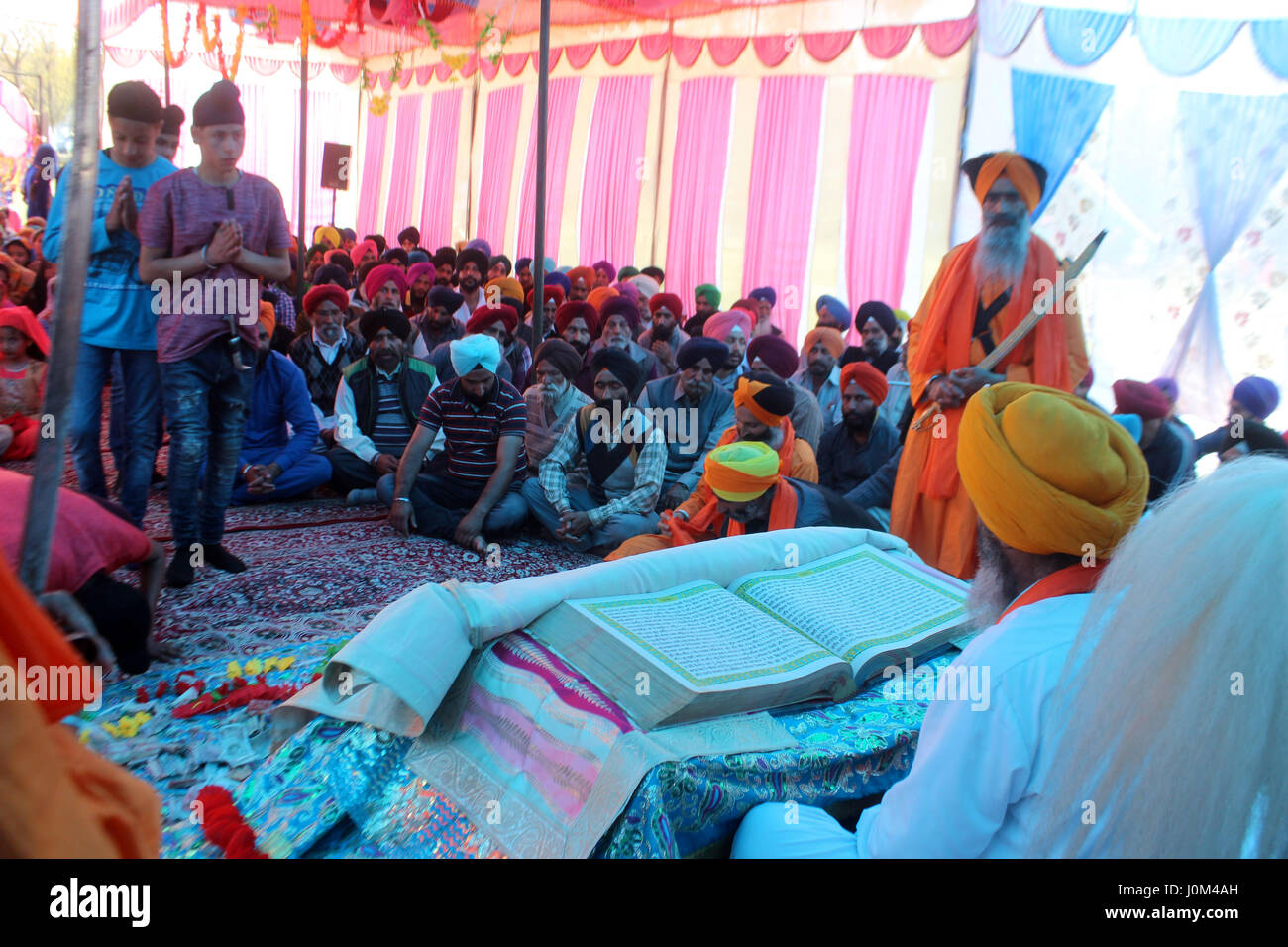 Anantnag, India. 14th Apr, 2017. Kashmiri Sikhs offer prayers at a ...