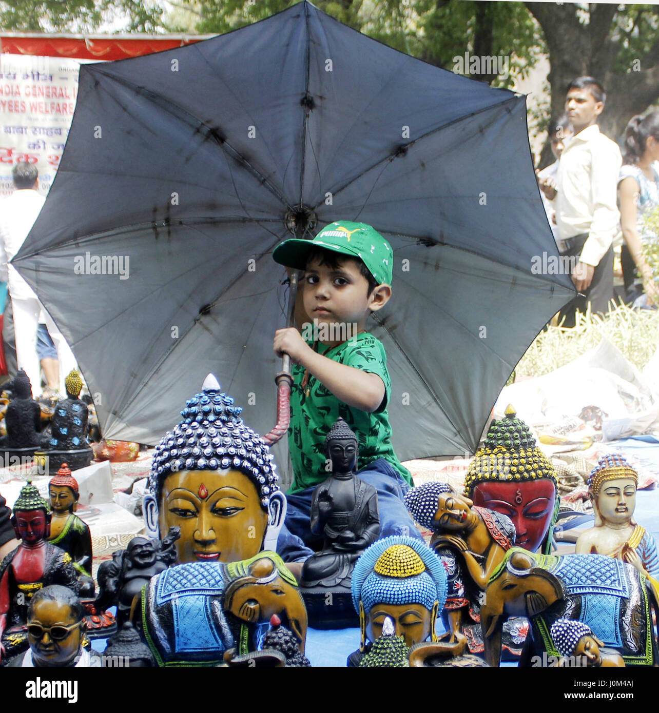 Delhi, India. 14th Apr, 2017. People purchasing Dr. Ambedkar posters ...