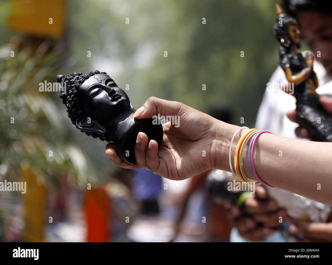 Delhi, India. 14th Apr, 2017. People purchasing Dr. Ambedkar posters ...
