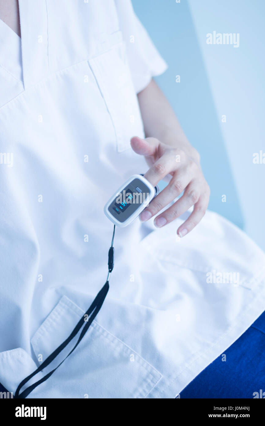 Blood pressure finger resting pulse monitor used to take heart rate and ...