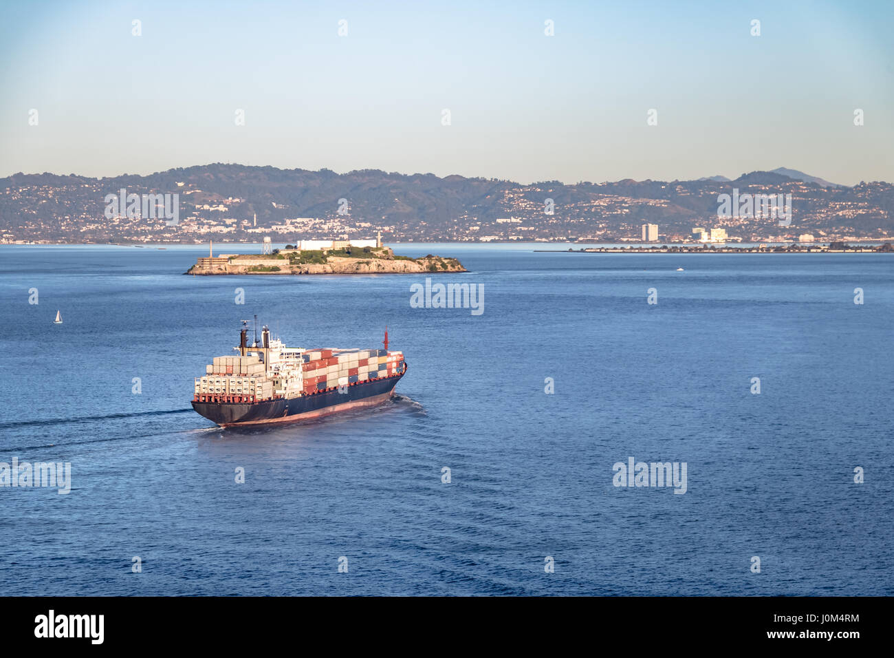 Container Cargo Ship entering San Francisco Bay and Alcatraz Island ...