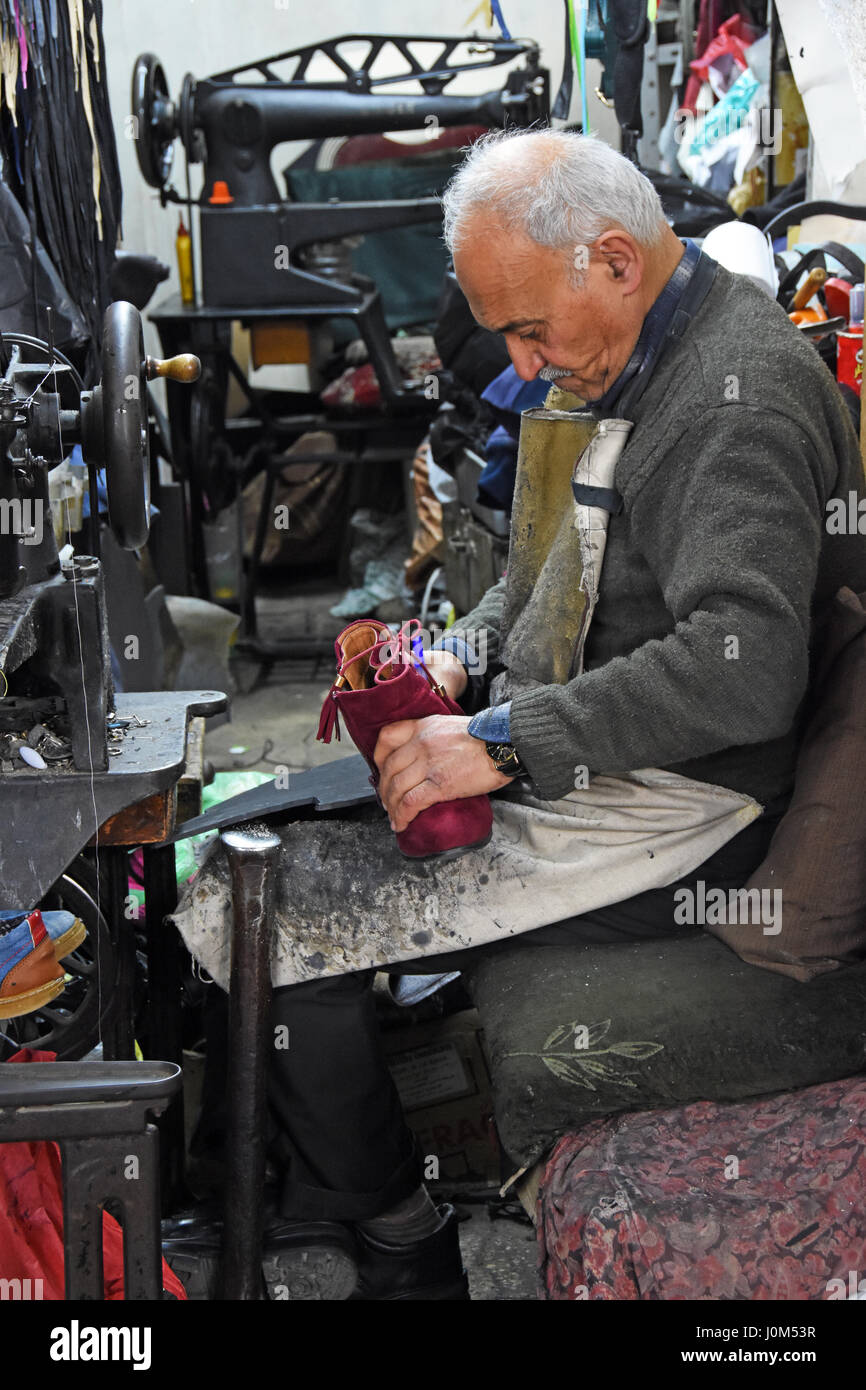 Old shoemaker hi-res stock photography and images - Alamy