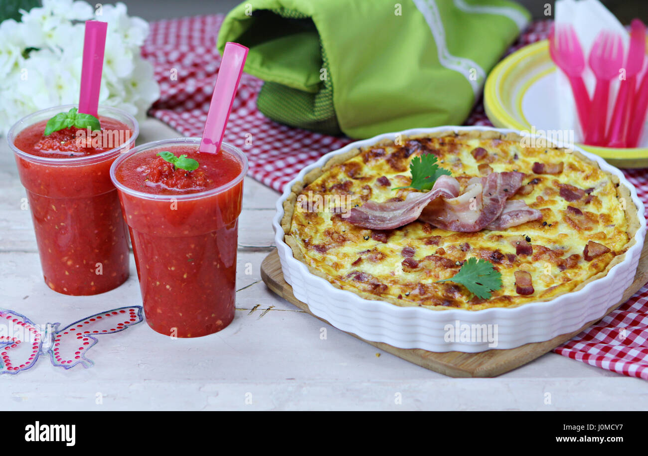 Summer picnic table - Quiche lorraine and gazpacho Stock Photo - Alamy