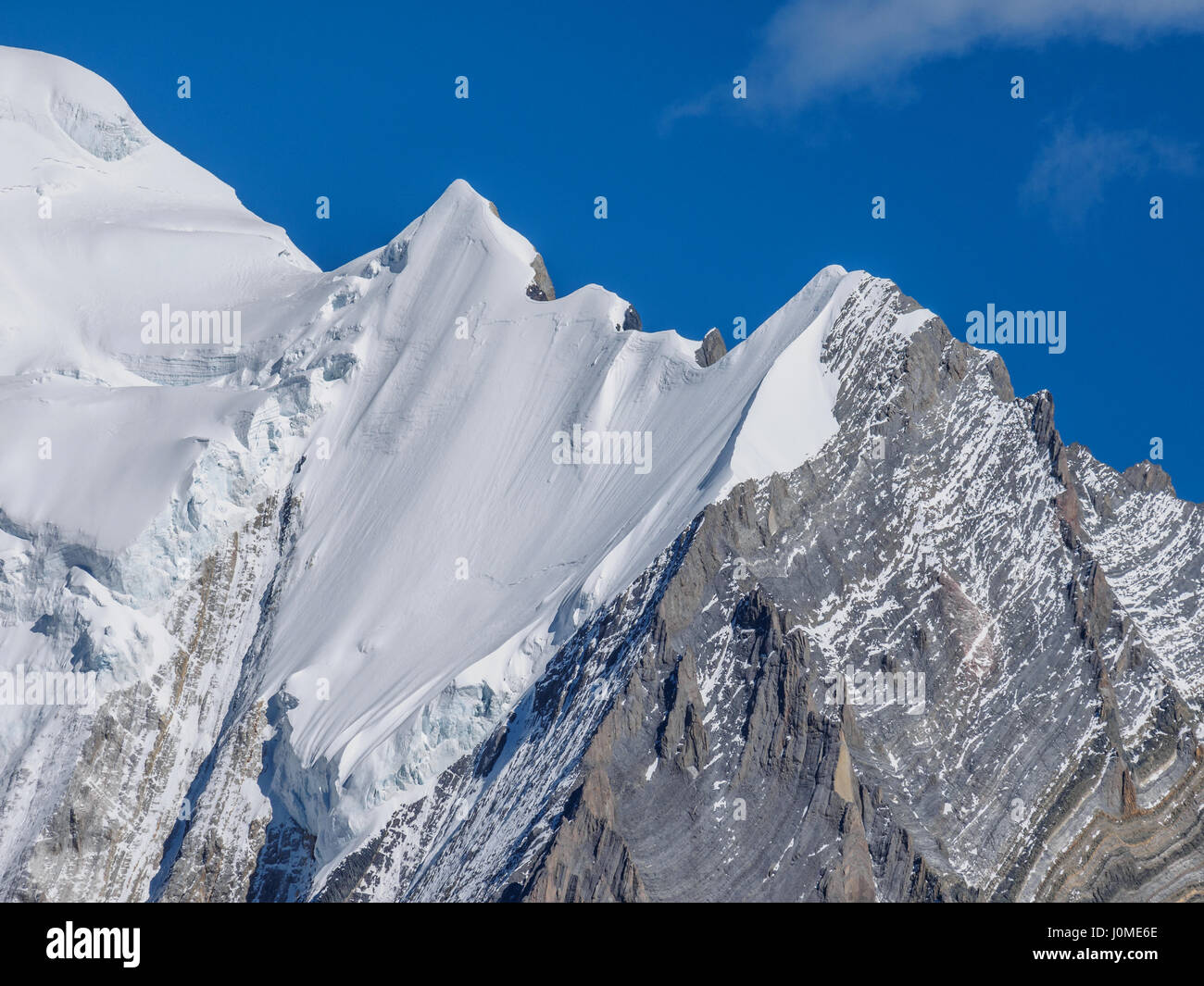 Snow peaks of Mount Chanodug on a clear day, Daocheng Yading National ...