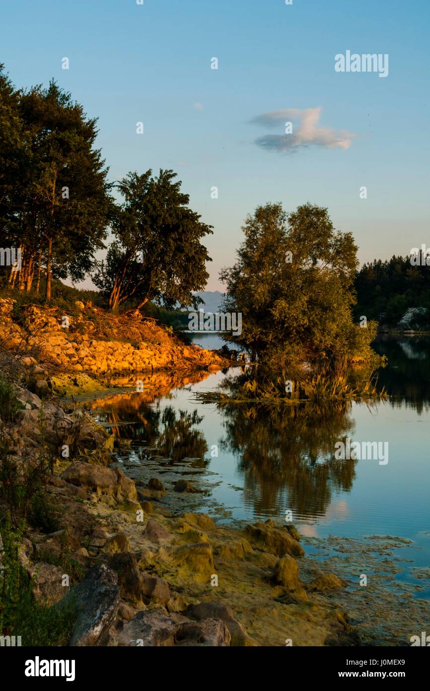 River Lika in Croatia warm sunset sunlight reflections on rocks Stock ...