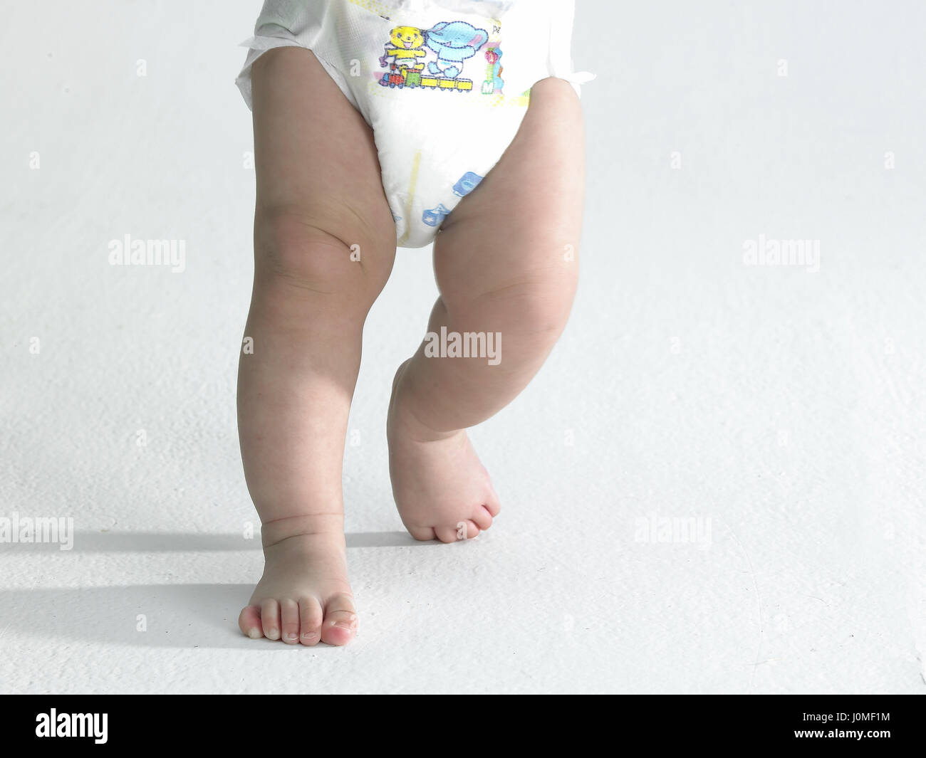 Baby walking diaper hi-res stock photography and images - Alamy