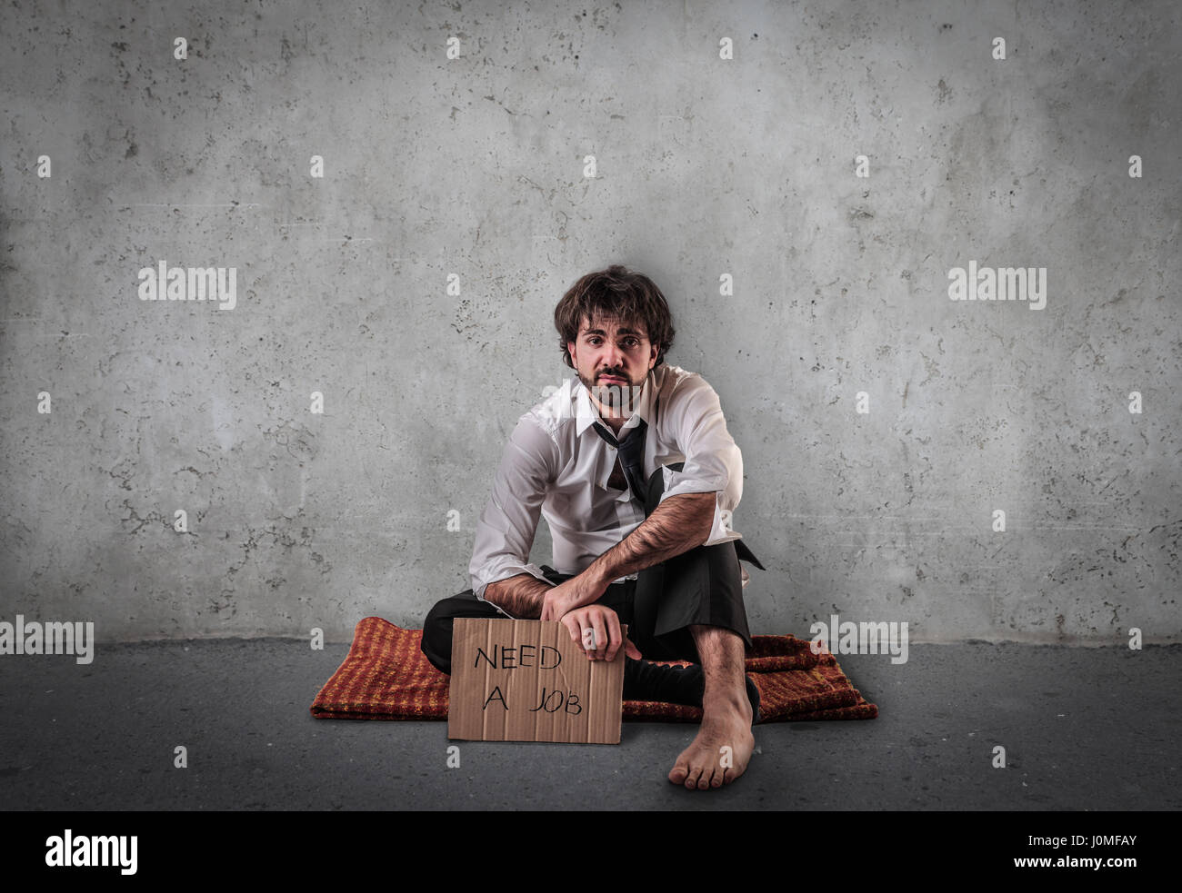 Homeless man on the street Stock Photo - Alamy