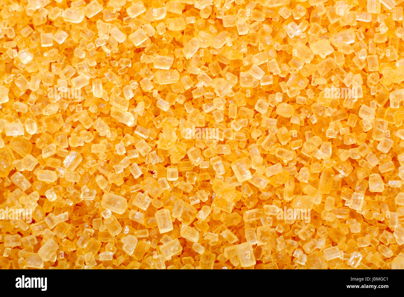 Brown cane sugar crystals close up. Full frame shoot Stock Photo - Alamy