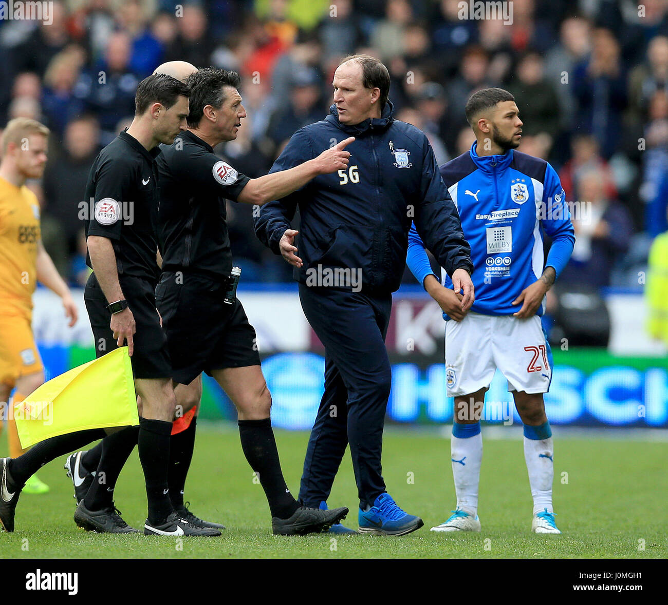 Preston North End manager Simon Grayson (right) speaks with referee Lee ...