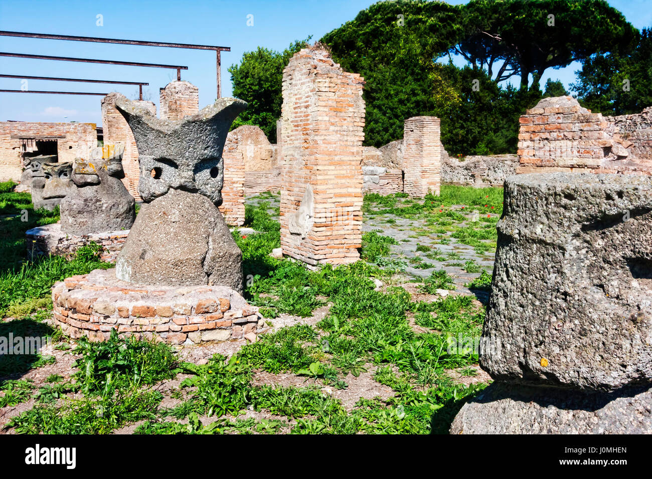 Palace of Molini with lava millstones - Ostia Antica - Italy Stock ...