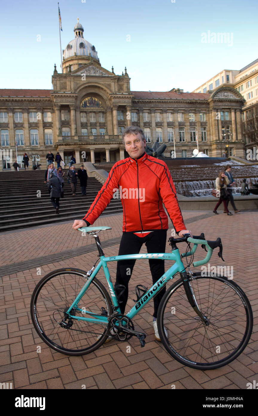 Paul Hudson on his bike in Birmingham in front of the Town Hall and ...