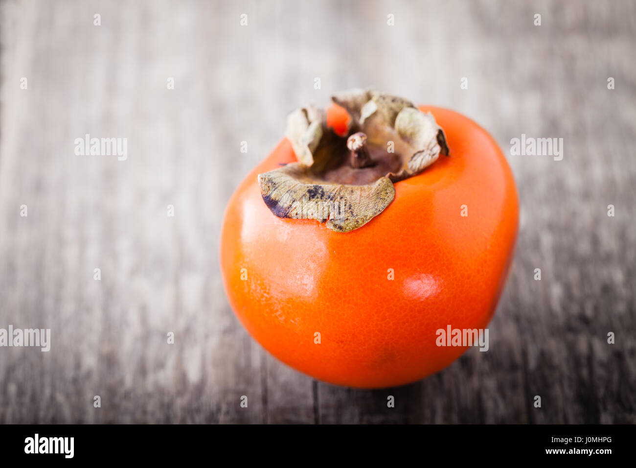 Persimmon hi-res stock photography and images - Alamy