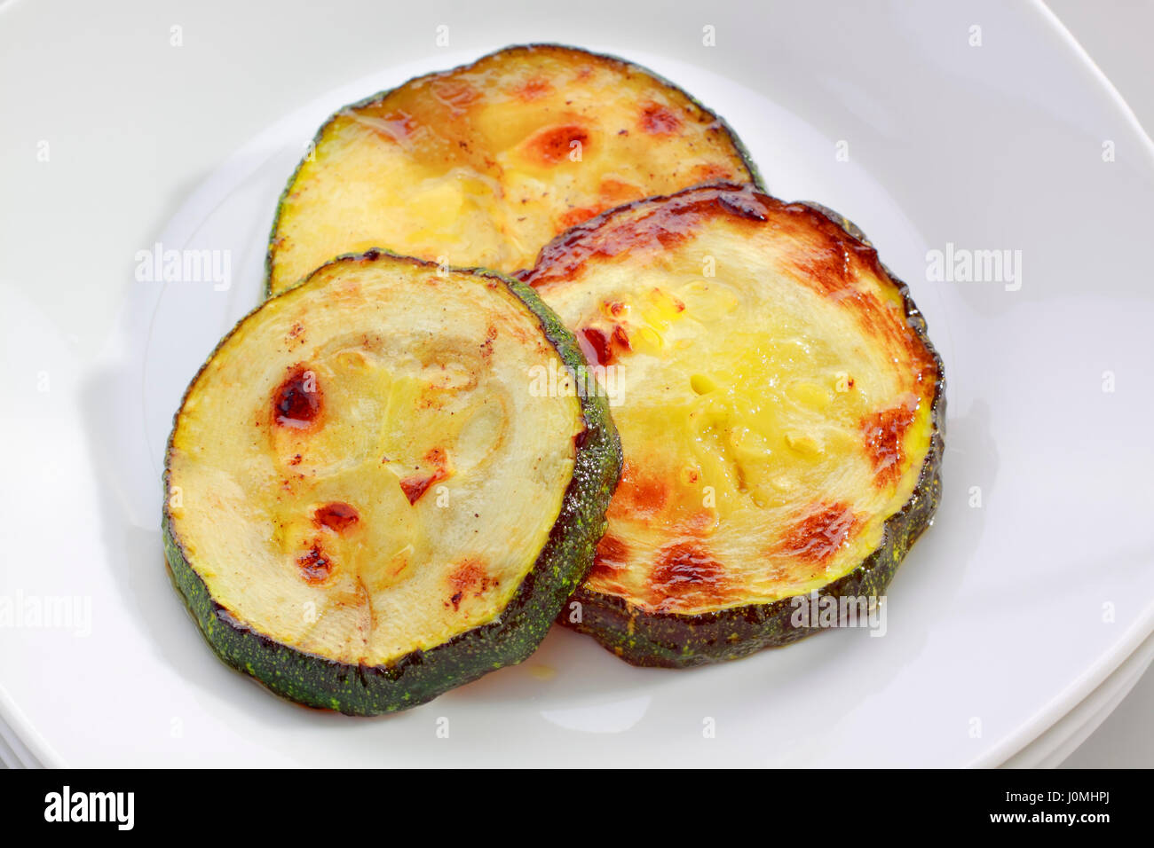 Courgette slices hi-res stock photography and images - Alamy