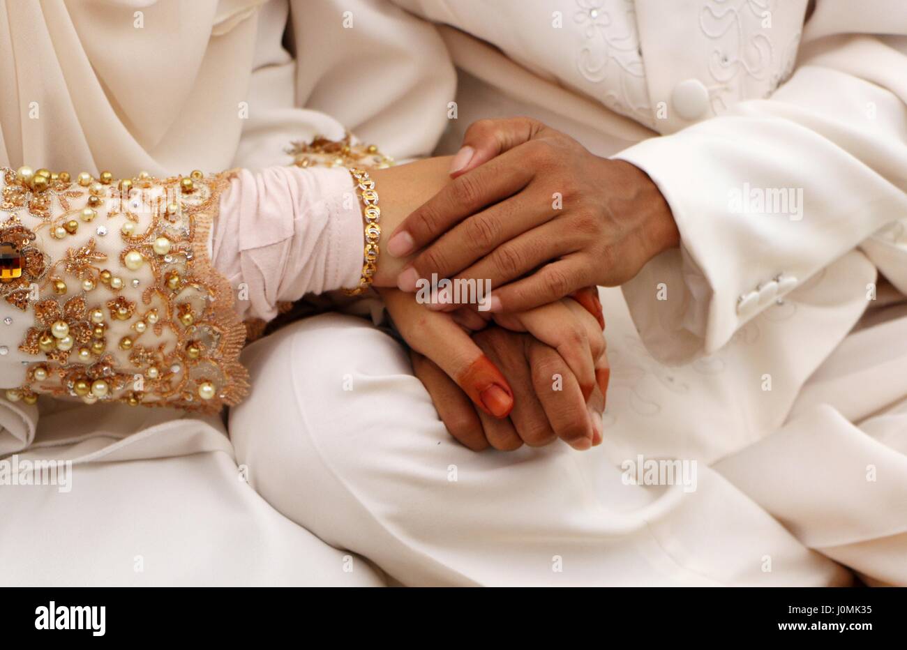 Lovely bride groom holding hands hi-res stock photography and images ...