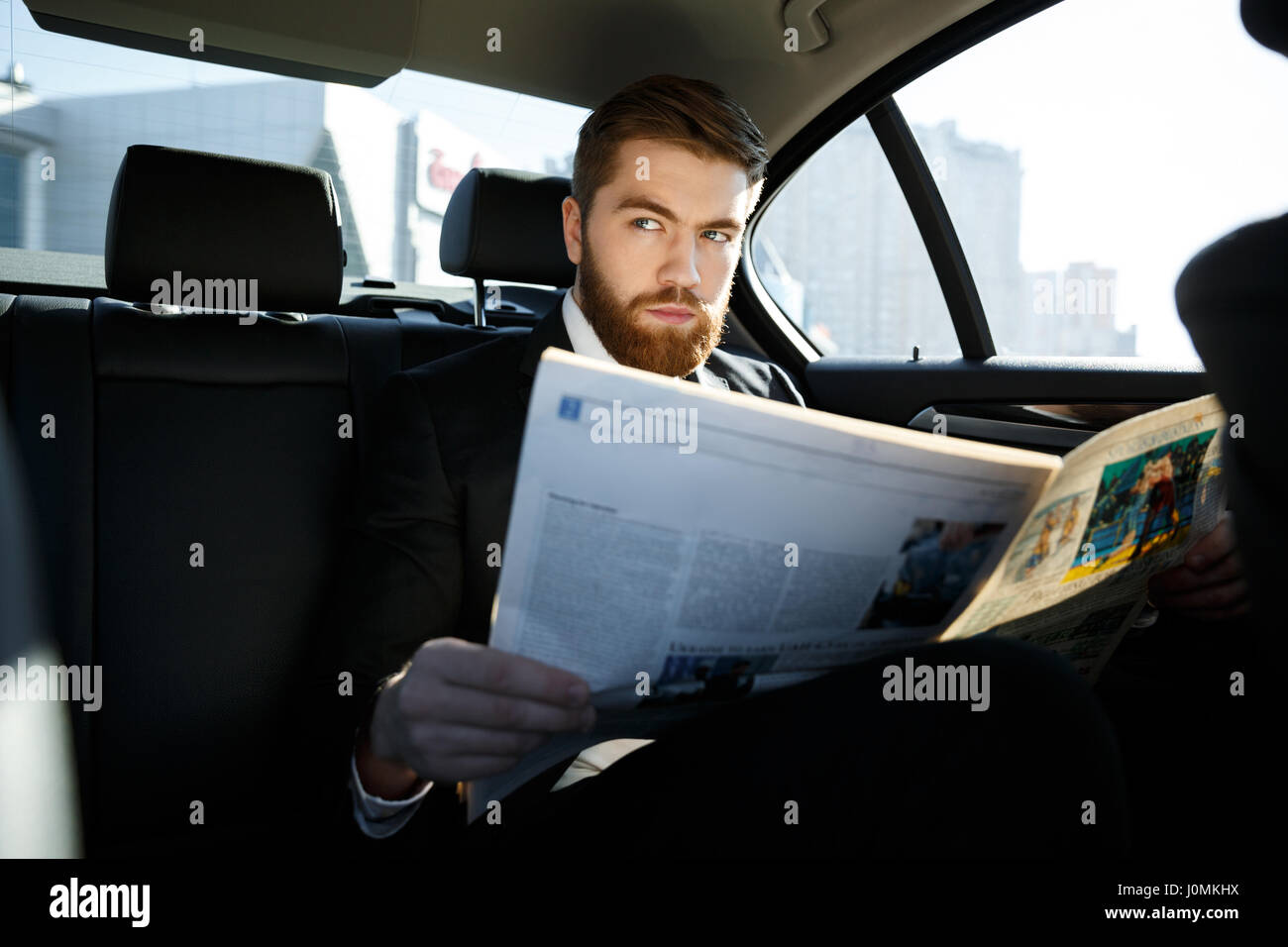 Newspaper in hands hi-res stock photography and images - Alamy