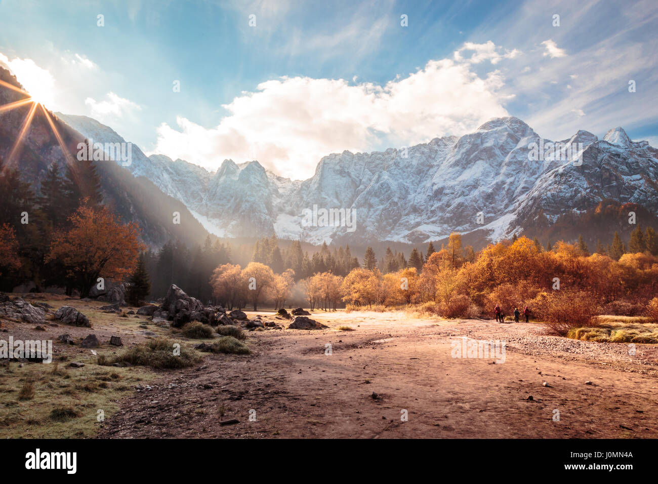 sun rise behind the peak in a colorful autumn morning Stock Photo - Alamy