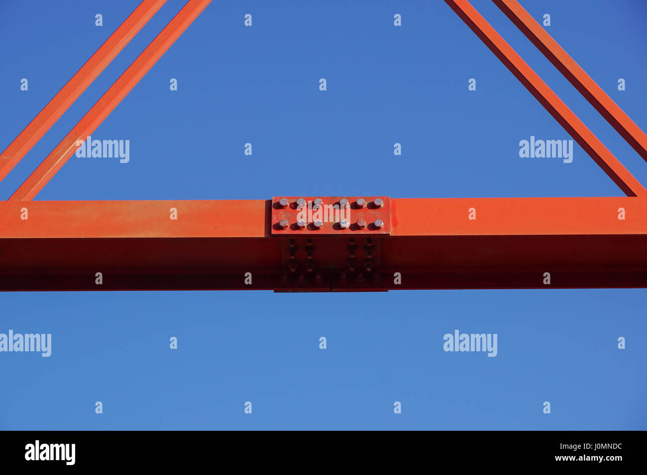 Details of a red modern bridge design and structure Stock Photo - Alamy