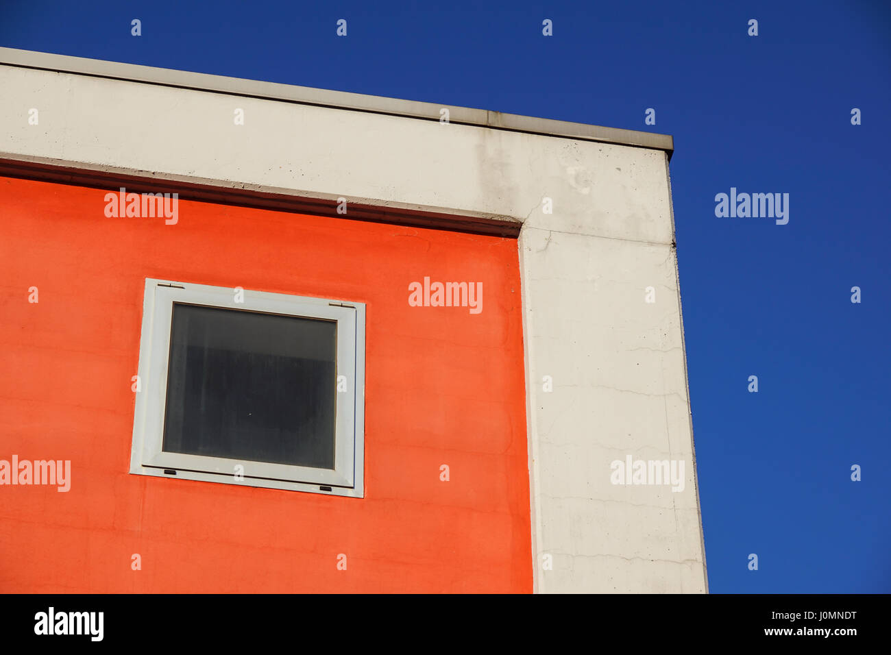 Architecture. Red facade of a building with windows. Colorful facade ...