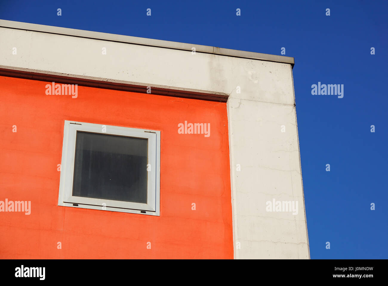 Architecture. Red facade of a building with windows. Colorful facade ...