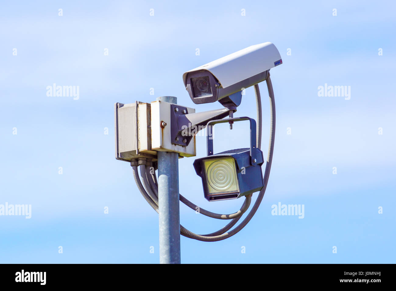 Security camera detects the movement of traffic. Skyscraper rooftop ...