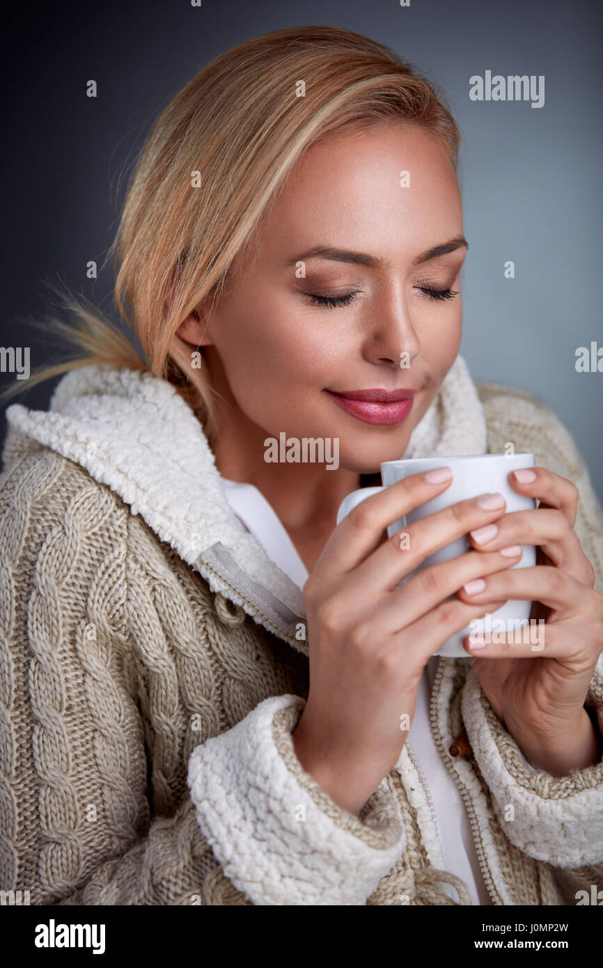 Beautiful blonde woman drinking tea hi-res stock photography and images ...