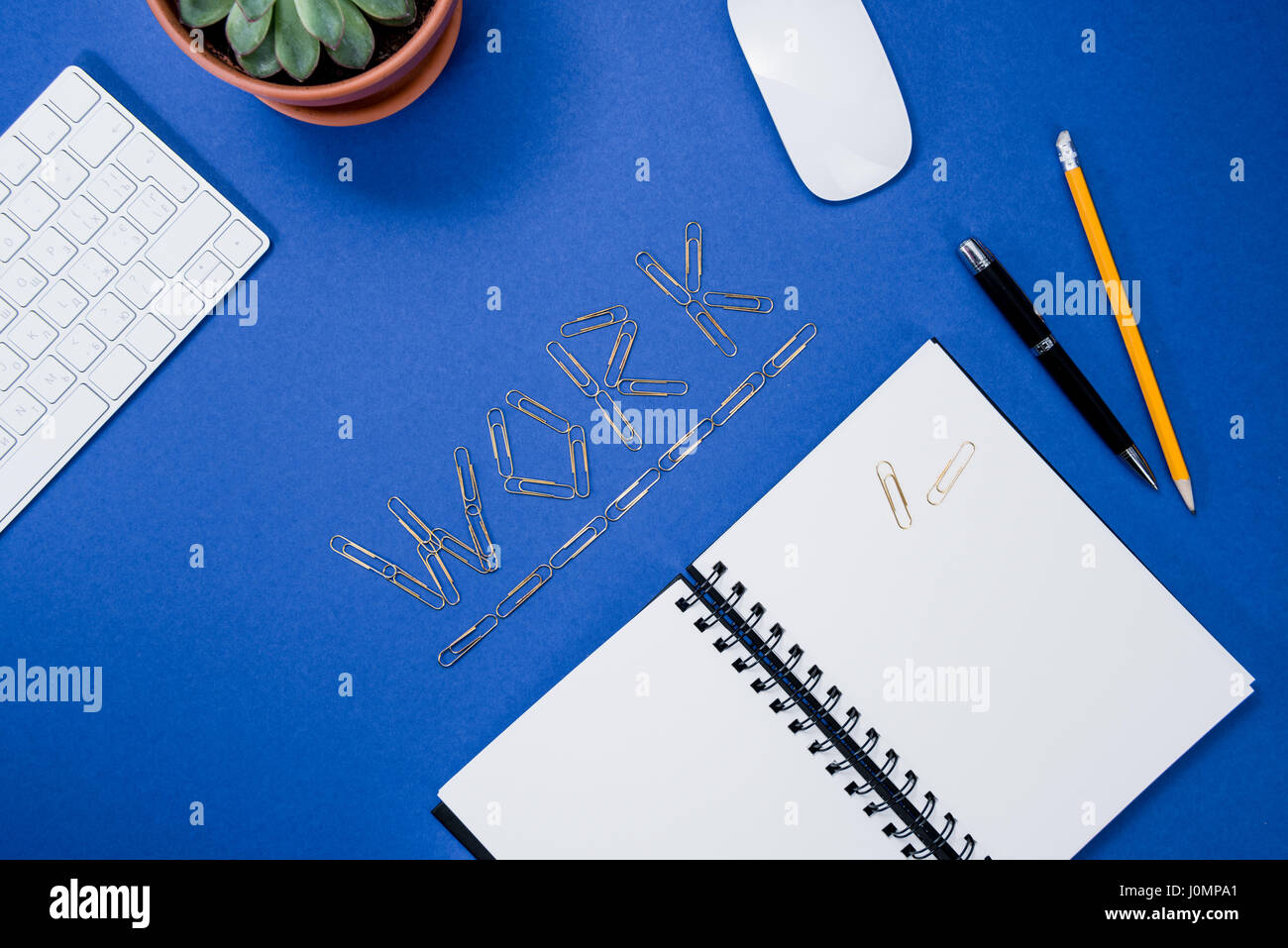 top view of work lettering, keyboard and notebook on office table Stock ...