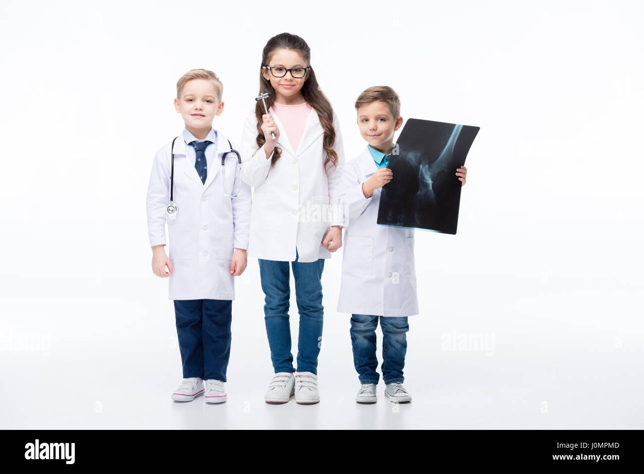 Kids playing doctor hi-res stock photography and images - Alamy