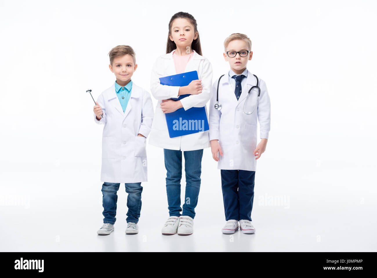 Full length portrait of three cute little kids pretending to be doctors ...
