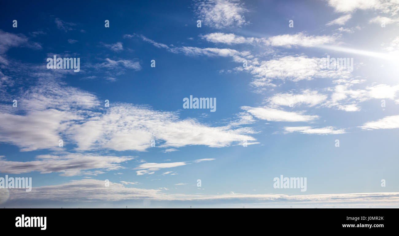 Blue sky with clouds on clear day Stock Photo - Alamy