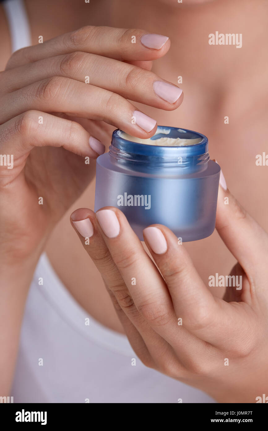 Apply the cream hi-res stock photography and images - Alamy