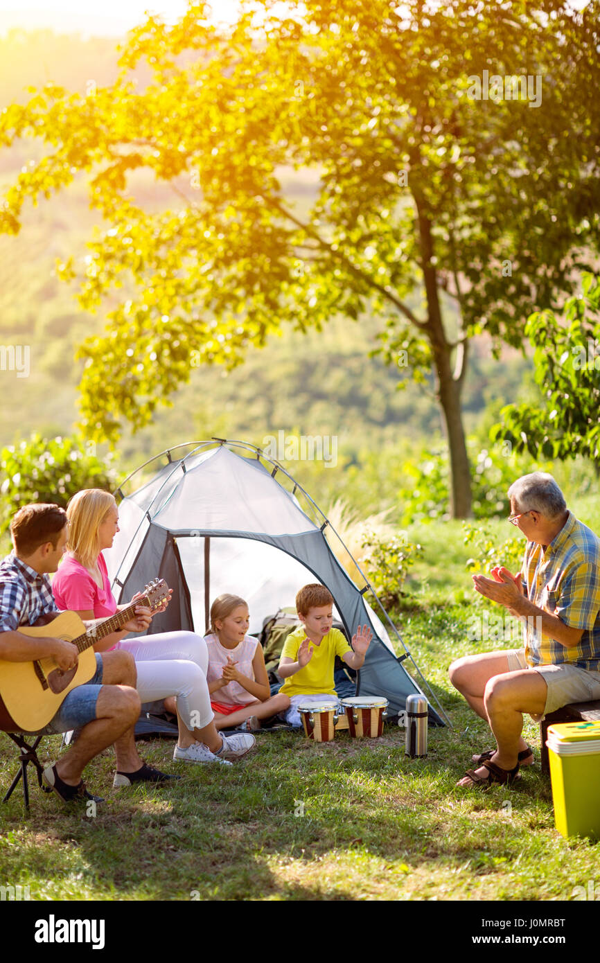 Happy family in the countryside together on a sunny day Stock Photo - Alamy