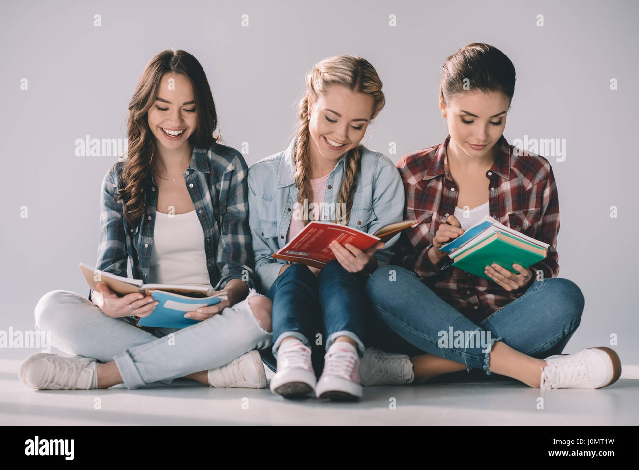 Three textbooks hi-res stock photography and images - Alamy